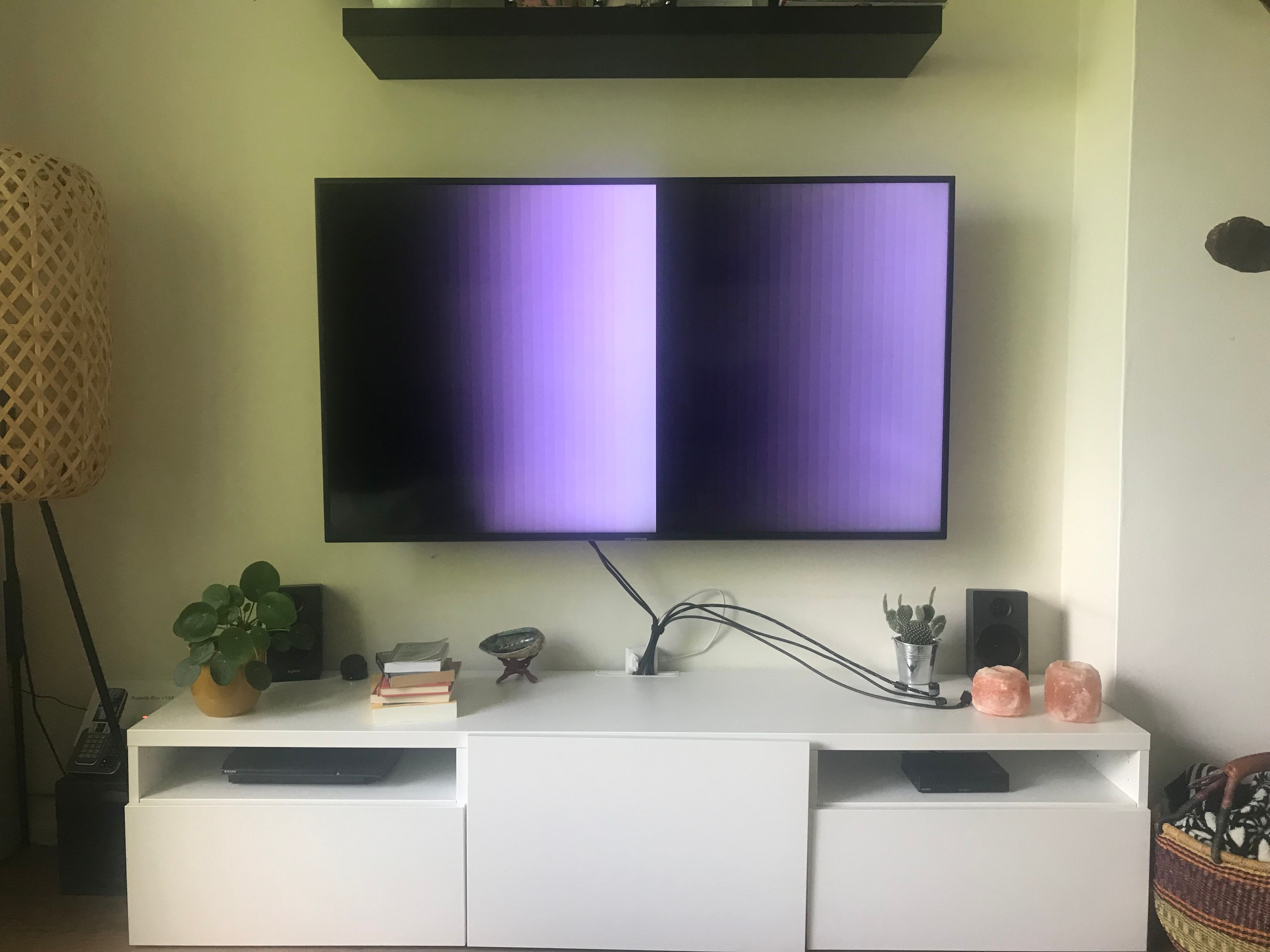 Opgelost: Zwarte vlek/schaduw linkerkant van het scherm - Samsung Community