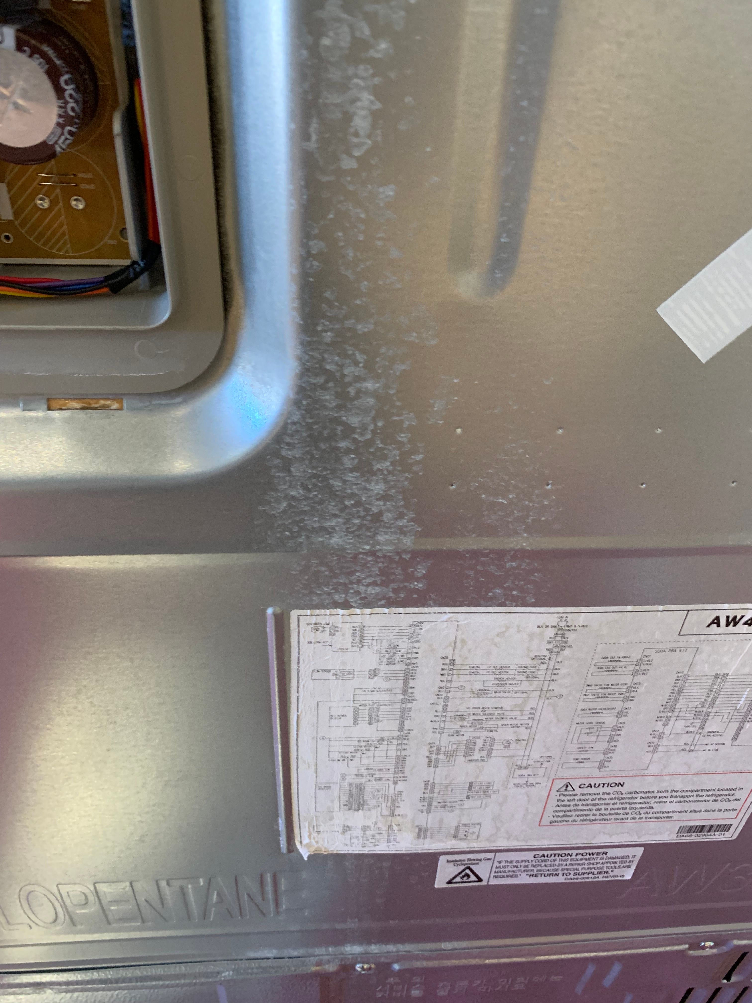 Rust on back of fridge caused damage - Samsung Community