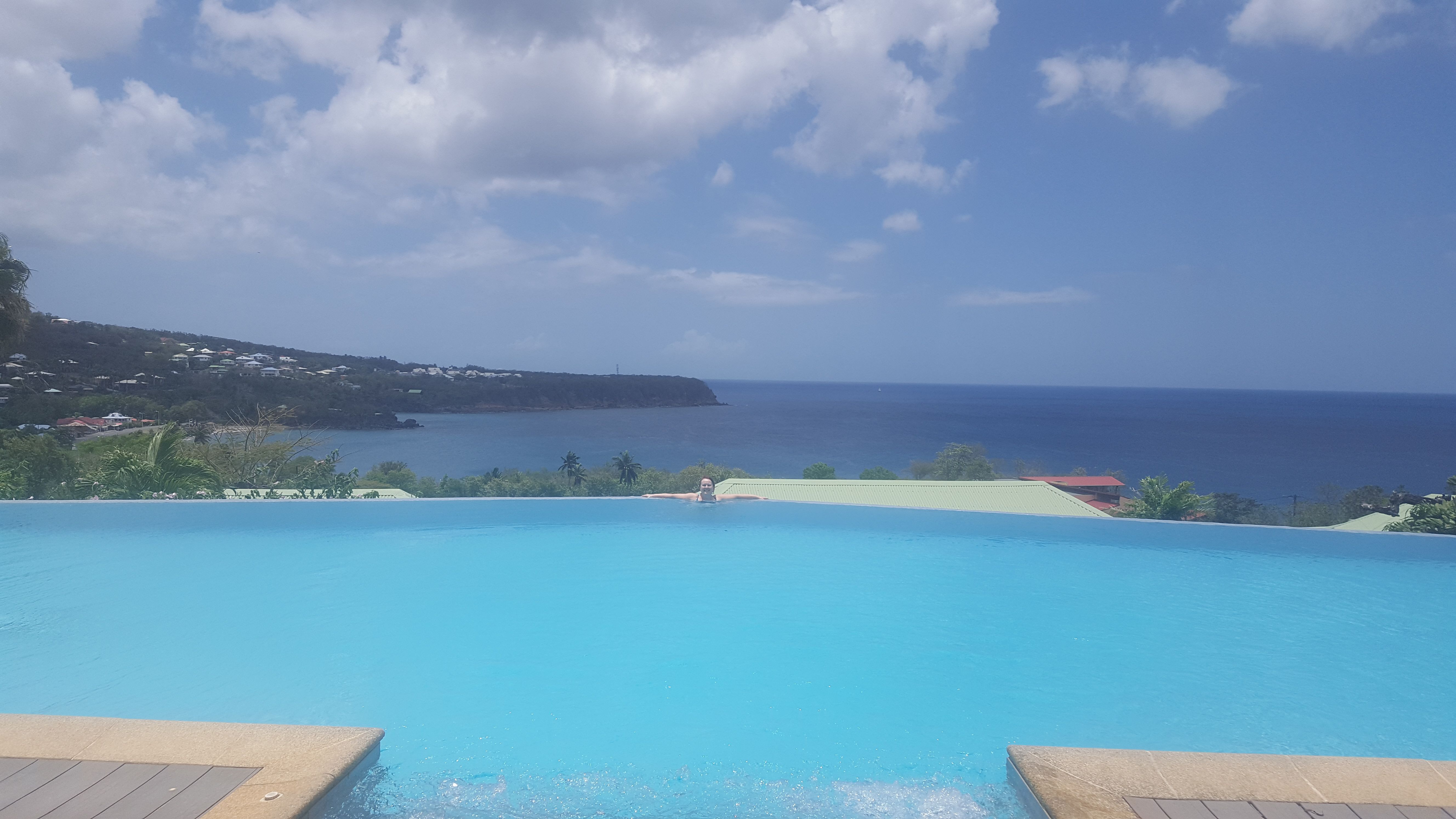 Oh to be here! Guadeloupe, villa, infinity pool, decent internet ...